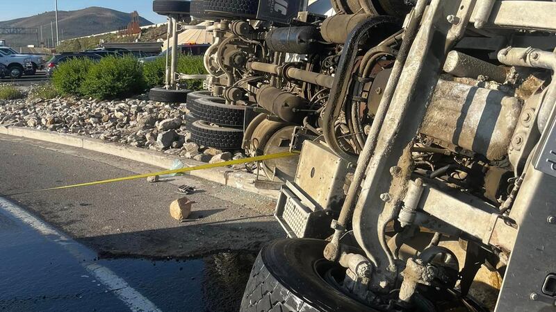 Driver Extricated After Concrete Truck Rolls Over